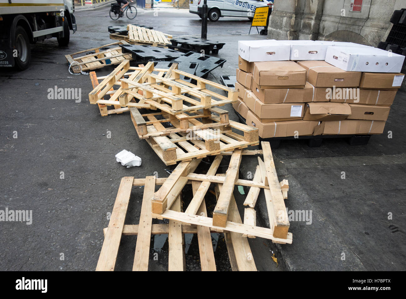 Pile of wooden crates outside on the pavement outside Smithfield Market ...