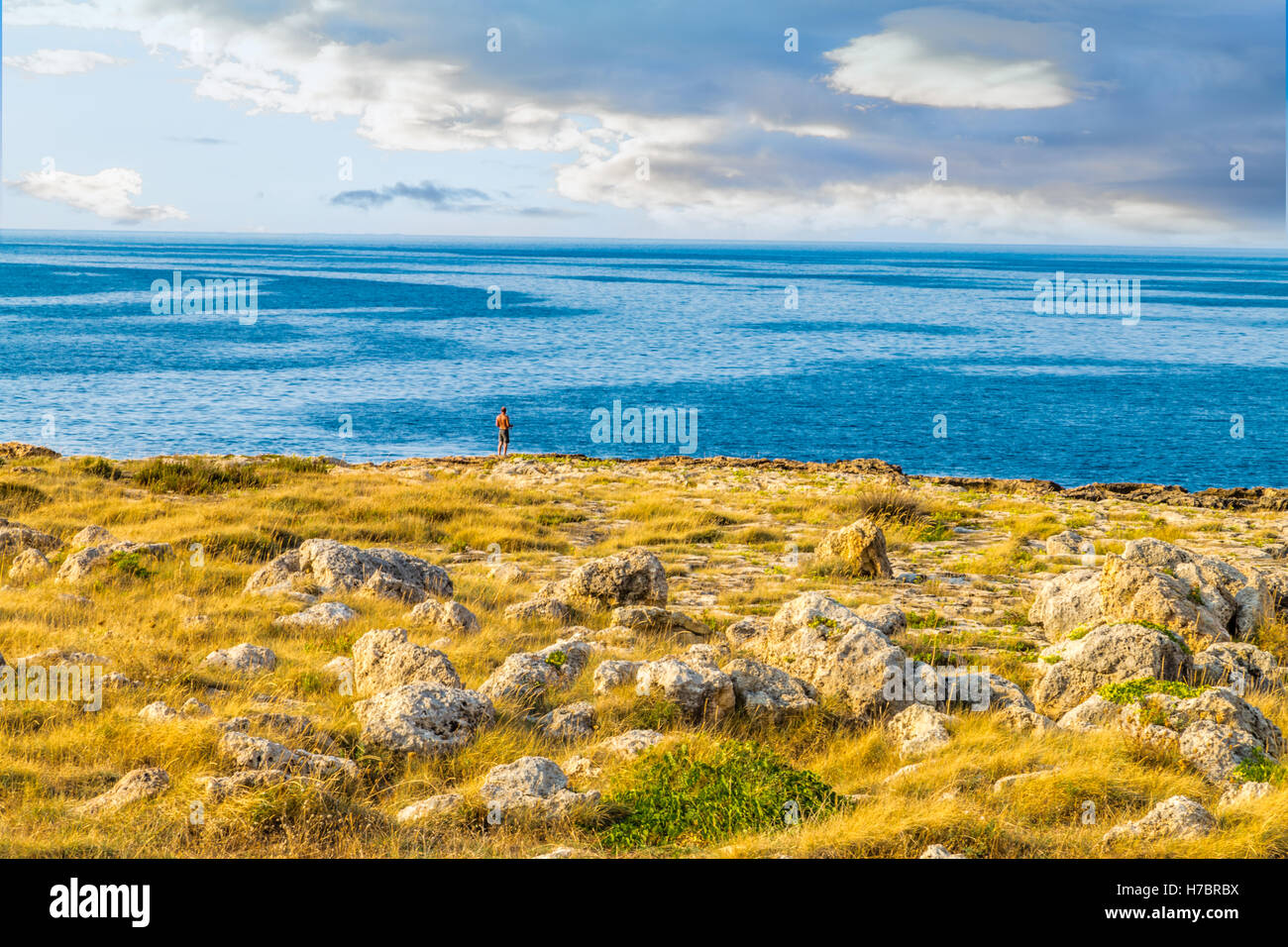 Man rocky shore italy hi-res stock photography and images - Alamy