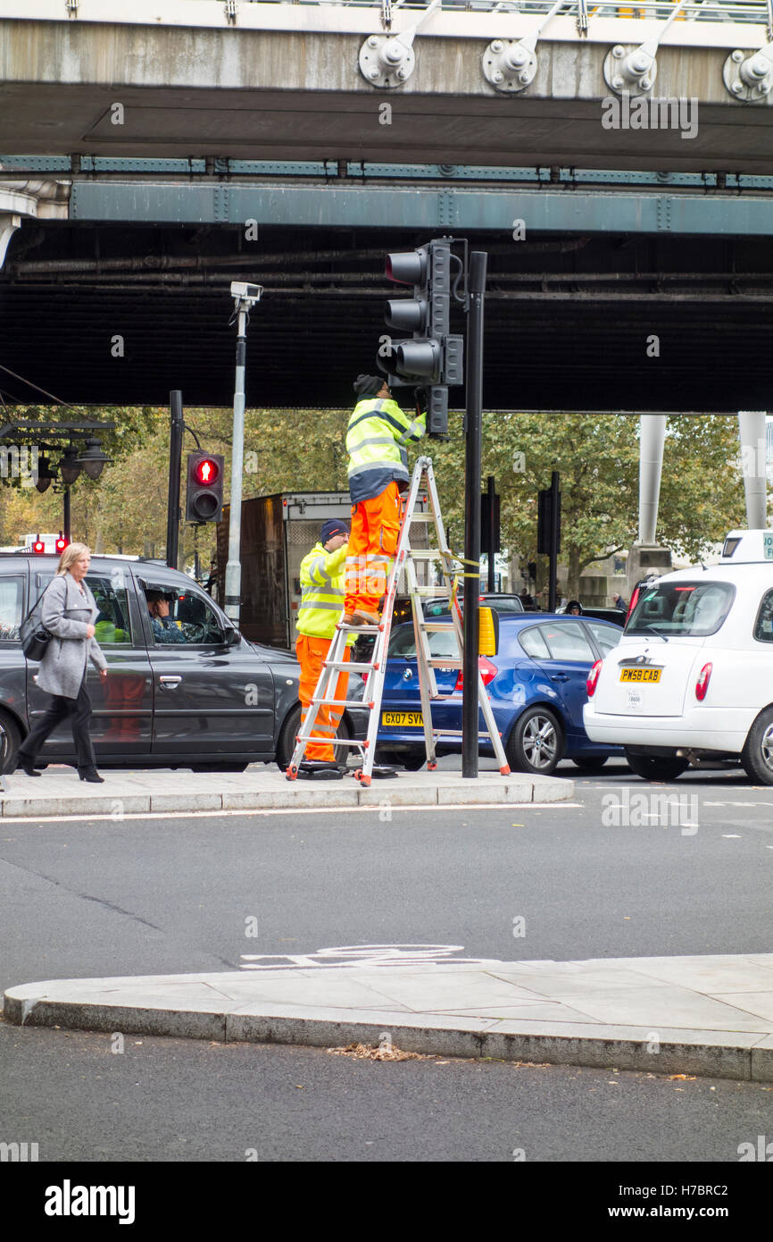 Fixing lights hi-res stock photography and images - Alamy