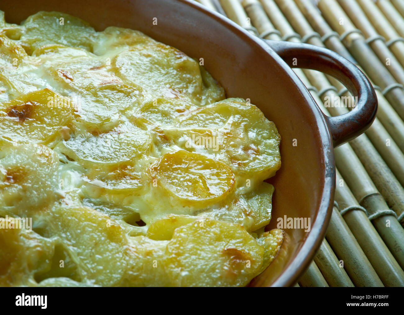 Pommes Anna classic French dish of sliced, layered potatoes cooked in a ...
