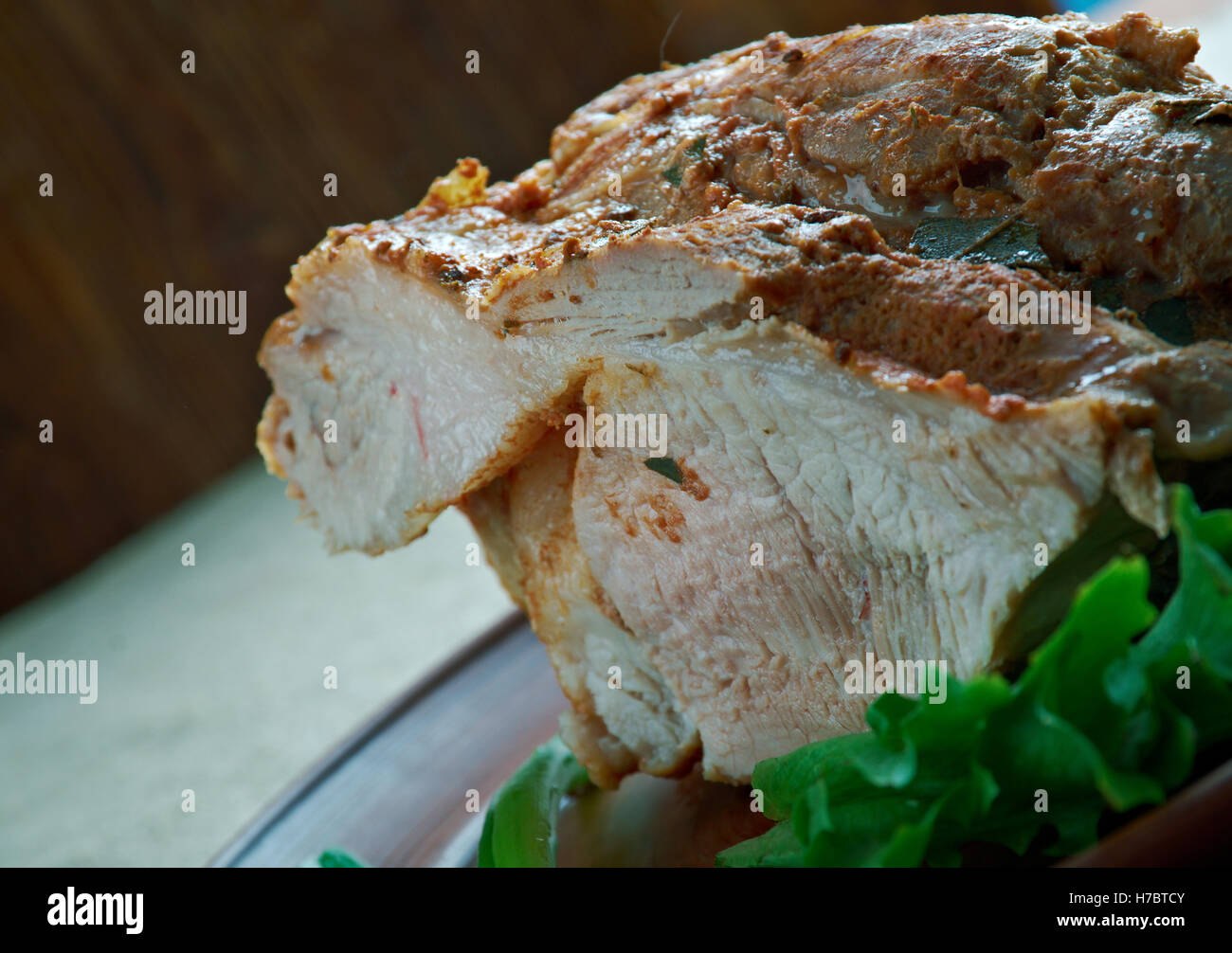 Kumpis - Lithuanian pork cooked ham.the old wooden background ...