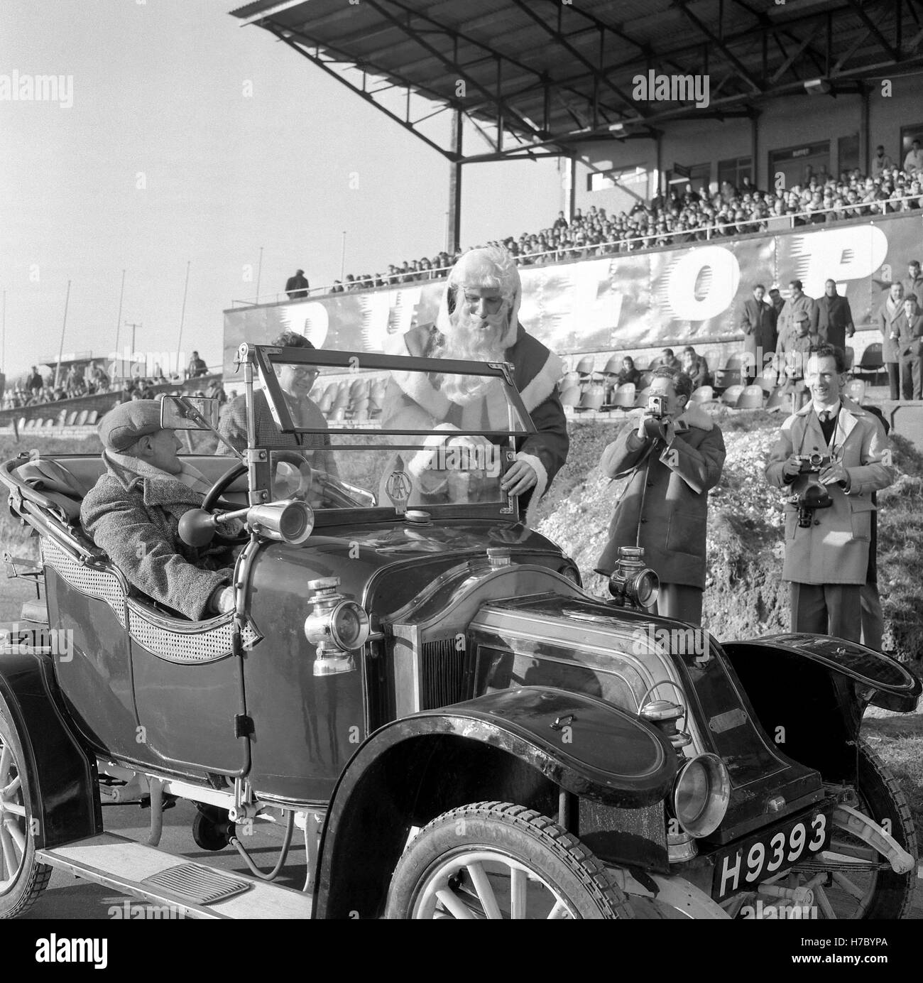 1961 Graham Hill British motor racing driver dressed as Santa Brands ...