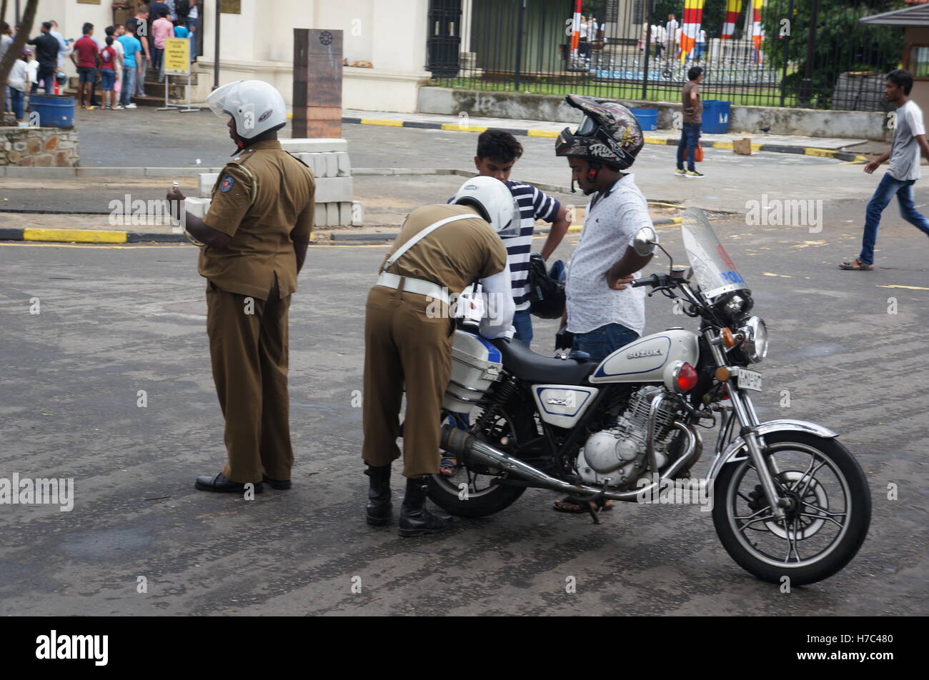 Police control two young motorcyclists in Kandy, Sri Lanka Stock Photo ...