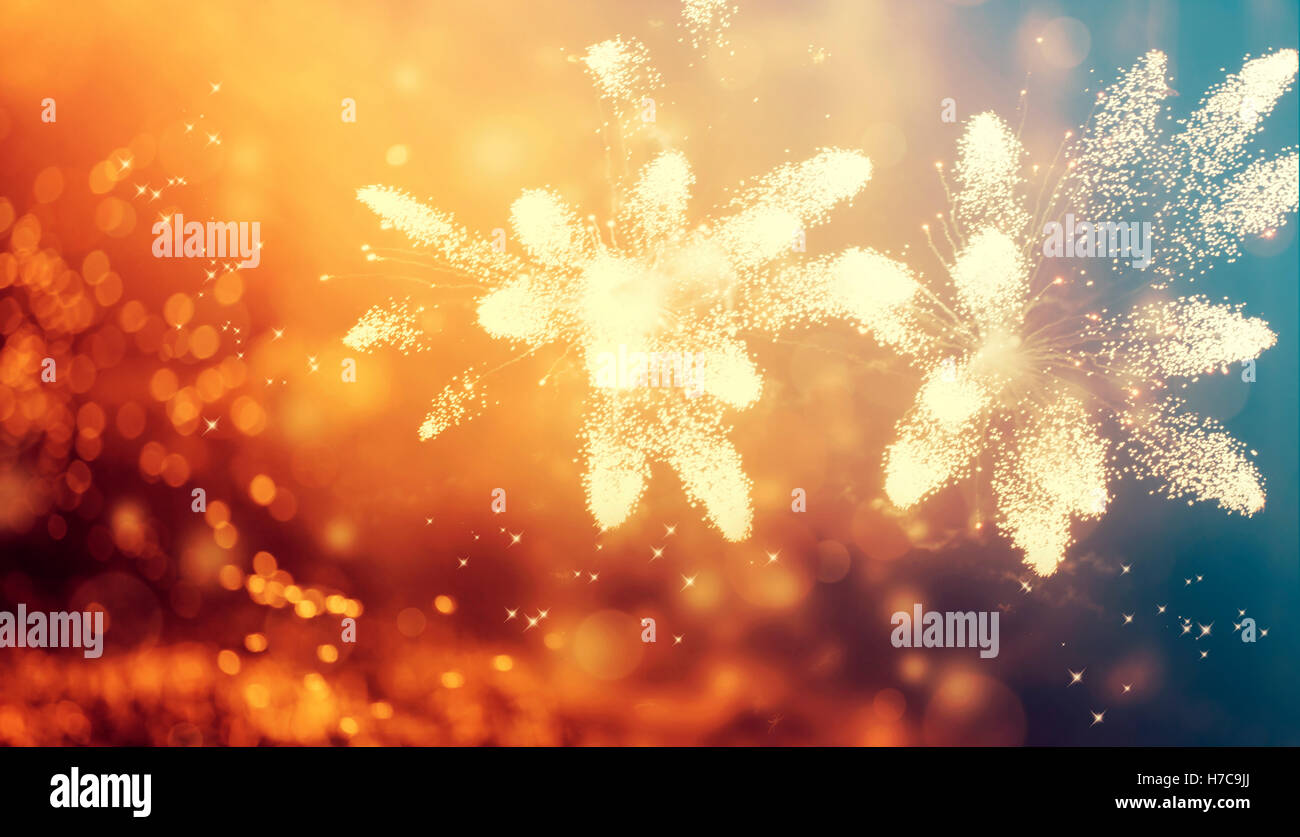 Abstract colorful holiday background of sky with fireworks and stars ...