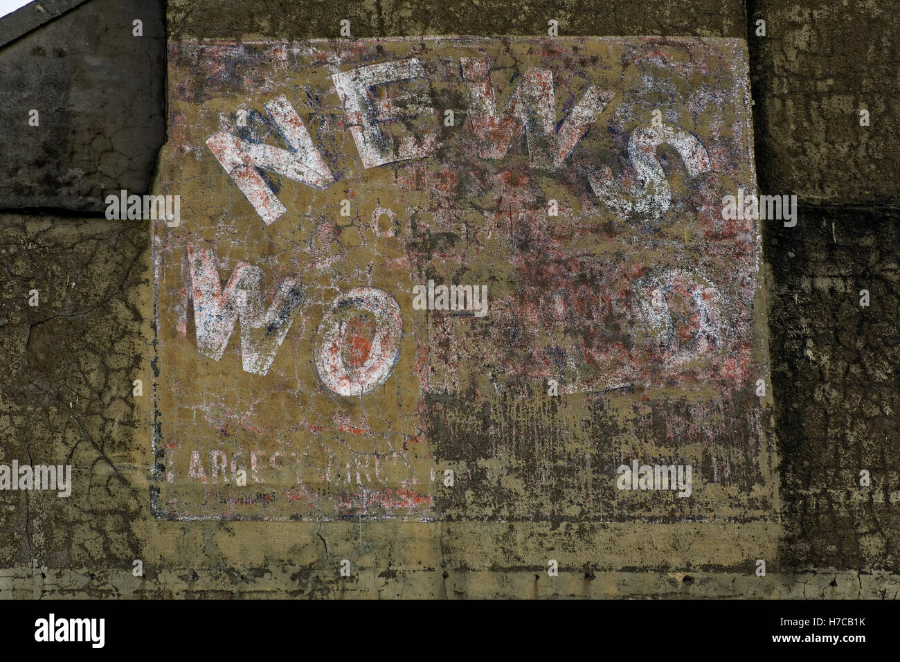 Old vintage advertising signs on the side of tenement building coke ...