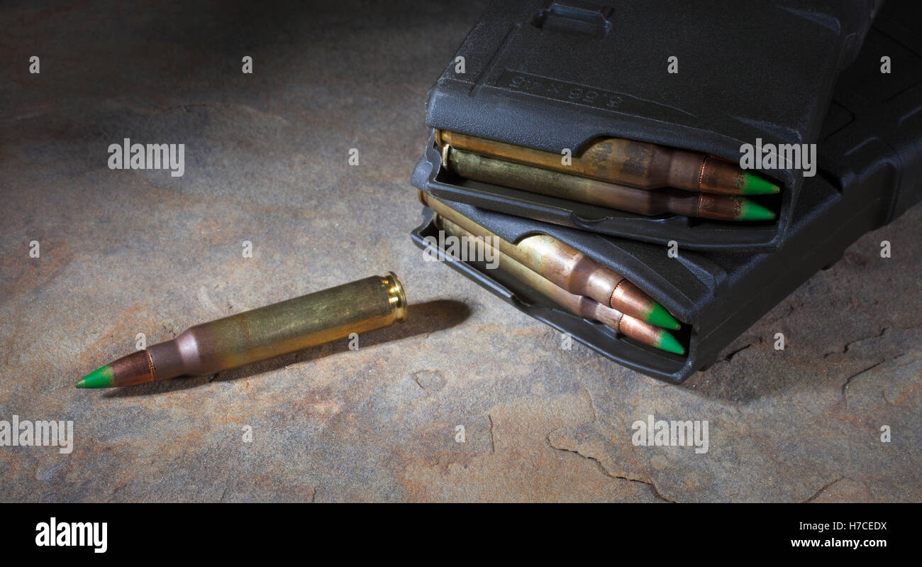 Polymer magazines for a rifle loaded with cartridges that have a green ...
