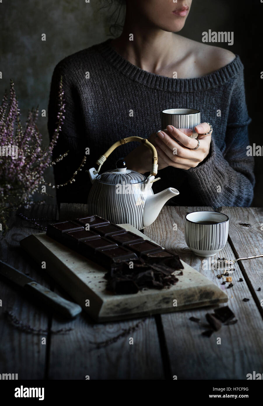 Tea time: woman drinking a cup of tea Stock Photo - Alamy