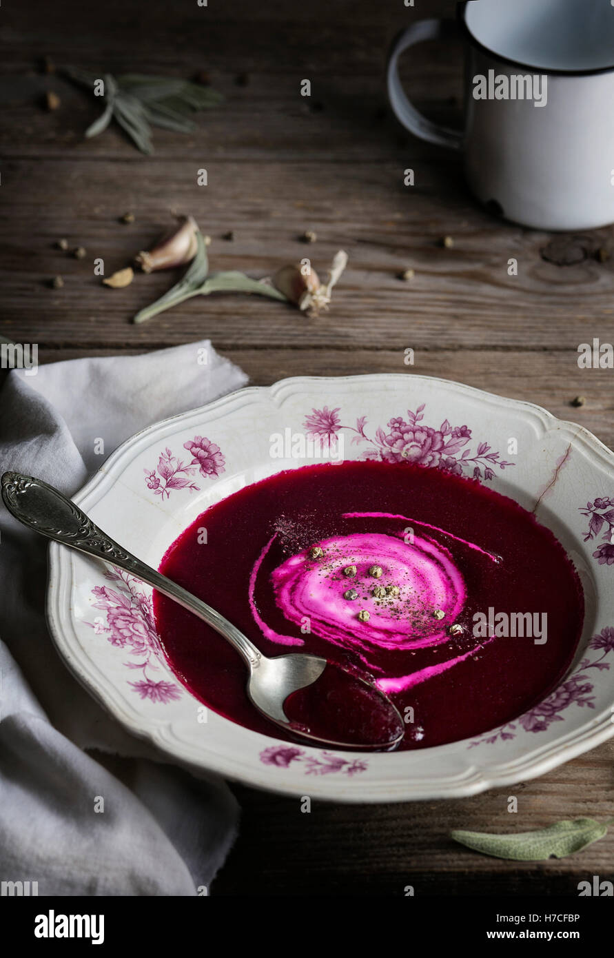 Beetroot cream soup on rustic table Stock Photo - Alamy