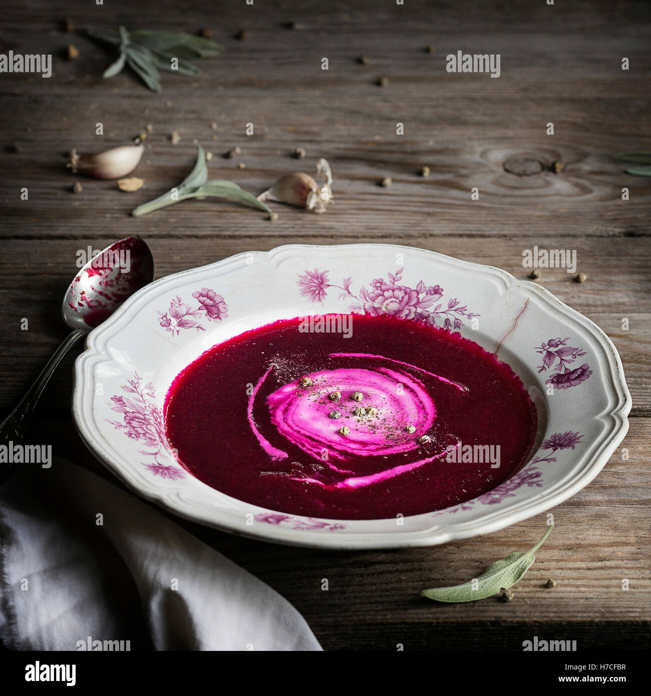 Beetroot cream soup on rustic table Stock Photo - Alamy