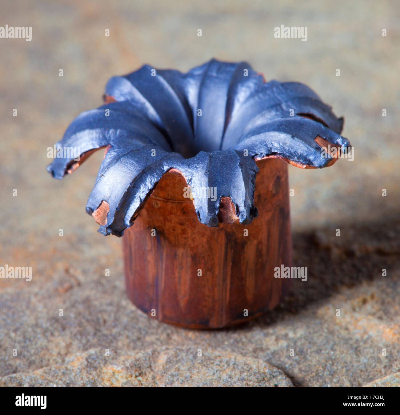 Hollow point handgun bullet that has expanded after impact Stock Photo ...