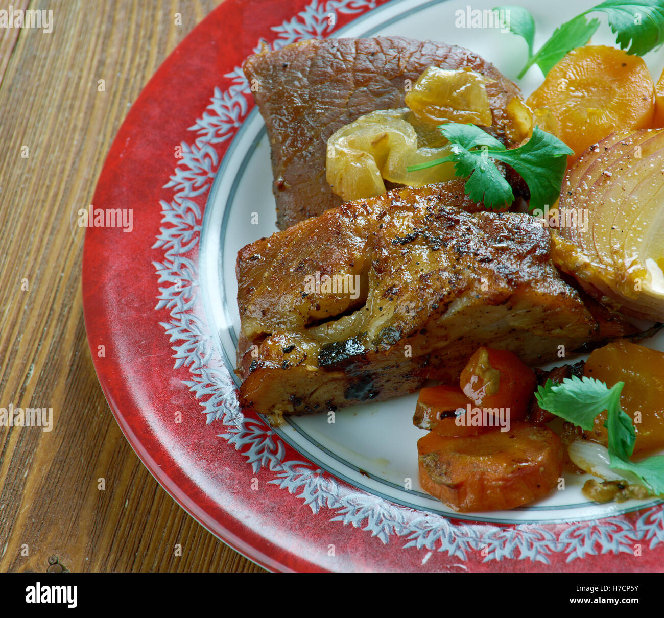 Roasted iberico pork loin close up Stock Photo - Alamy