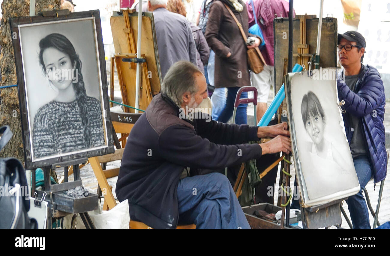 Artists drawing portraits at Place du Tertre on Montmartre in Paris ...