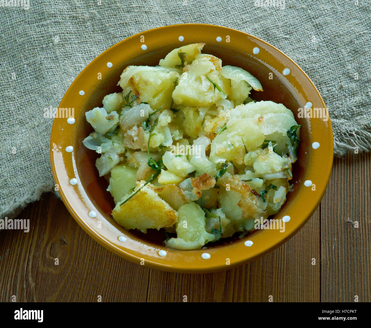 Tushanka- Belarusian potato stew on a wooden background Stock Photo - Alamy