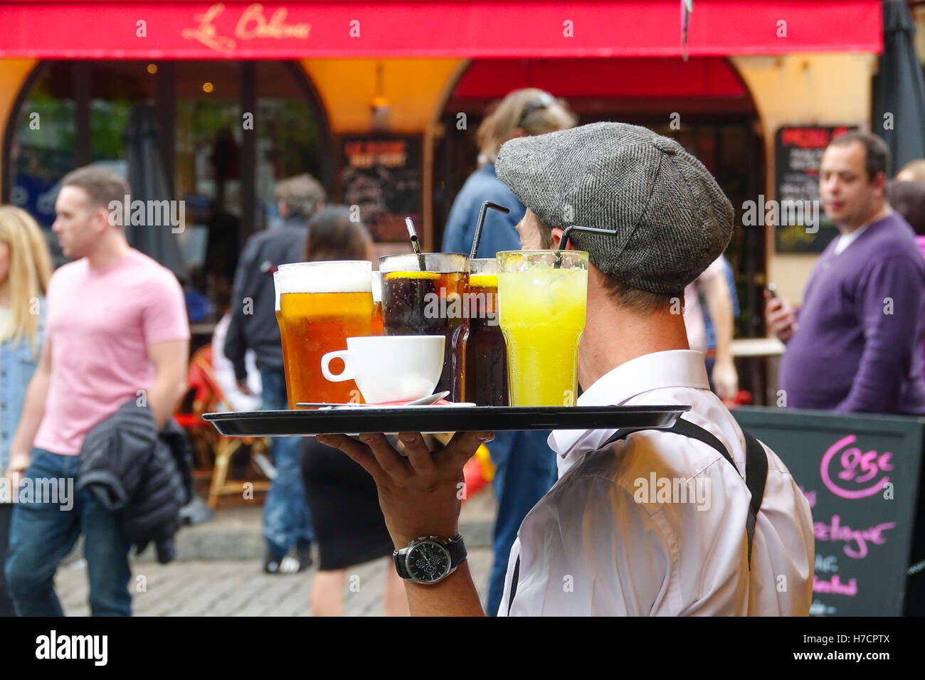 French waiter at a street cafe - called garcon Stock Photo - Alamy
