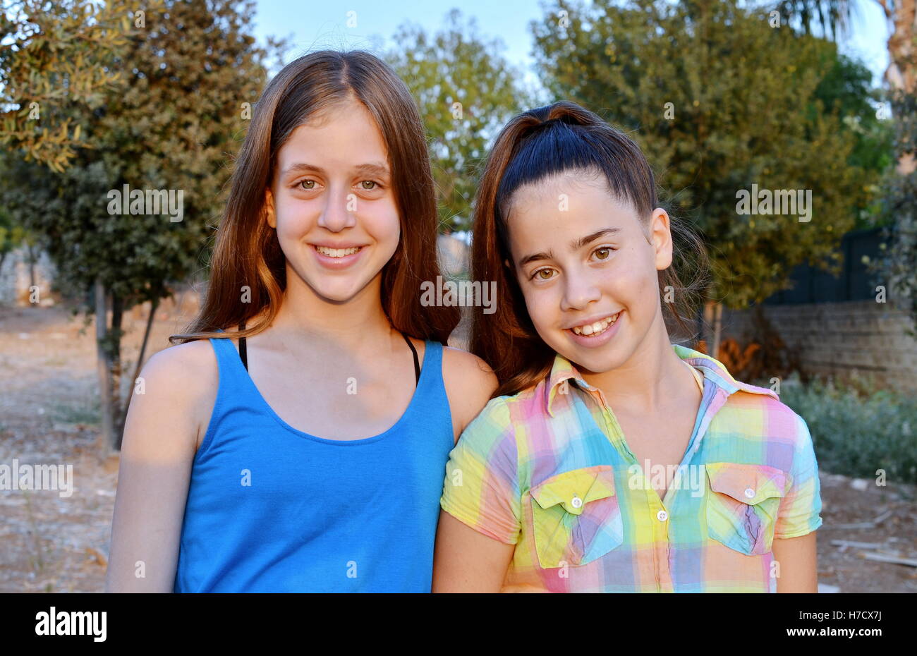 Best Friends Forever - two 12 year old teenage girls smiling and having ...