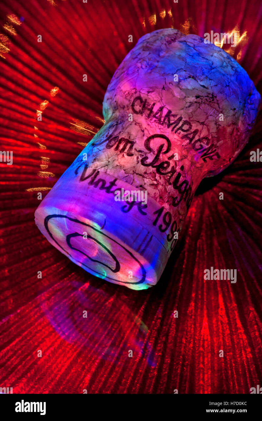 Dom Perignon vintage Champagne cork on reflective party table surface ...