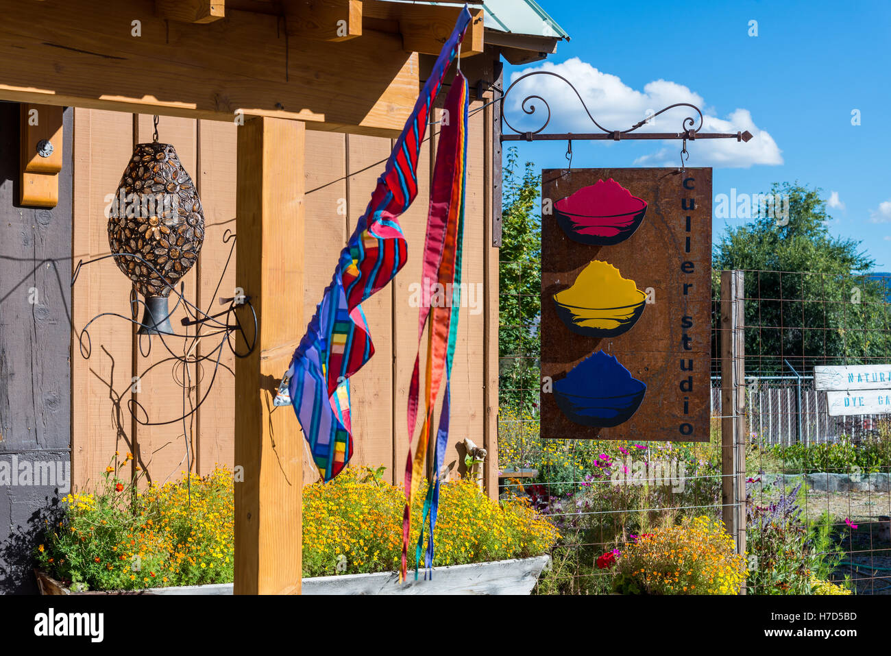Colorful signs in front of a textile workshop in small town Twisp ...