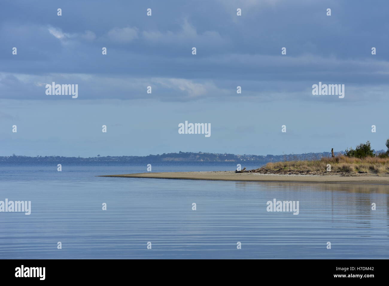 Calm sea around a sand spit Stock Photo - Alamy