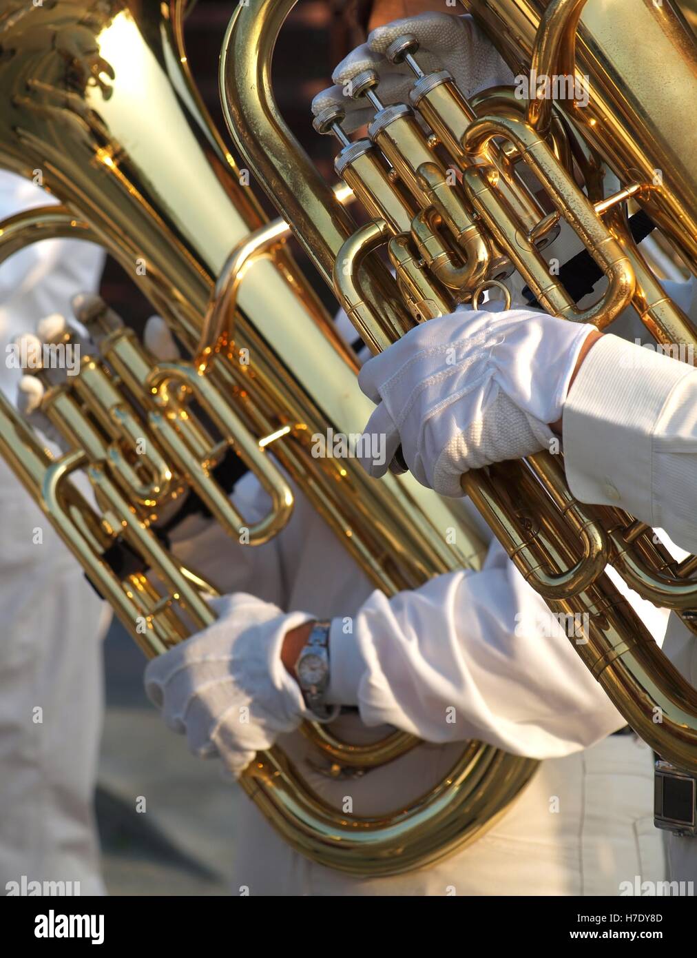 Partial view of two tubas that are part of a brass band Stock Photo - Alamy