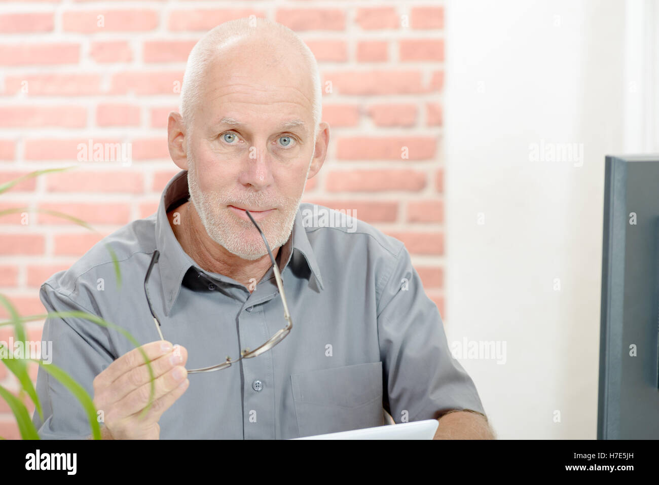 middle-age businessman working on computer in office Stock Photo - Alamy