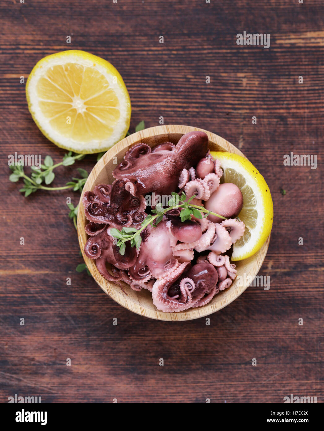 marinated octopus with herbs and spices Stock Photo - Alamy