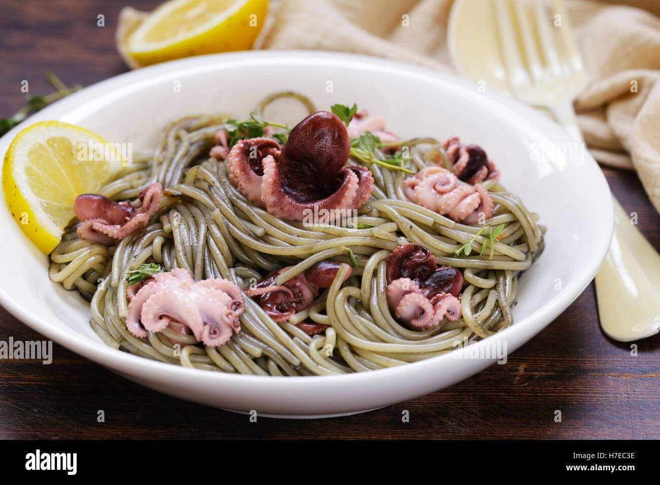 black pasta with black cuttlefish sauce Stock Photo - Alamy