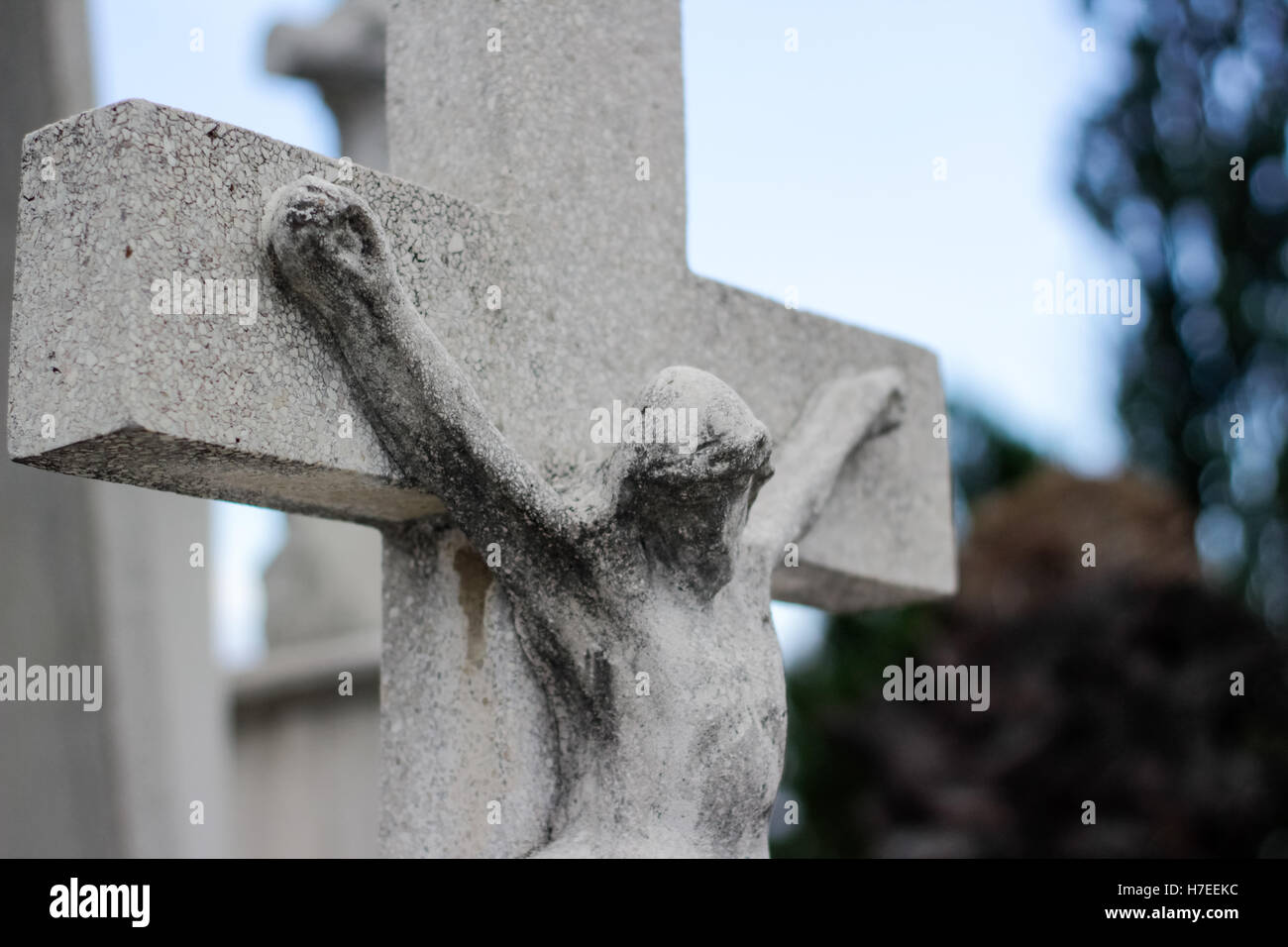Photograph of a stone crucifix statue Stock Photo - Alamy