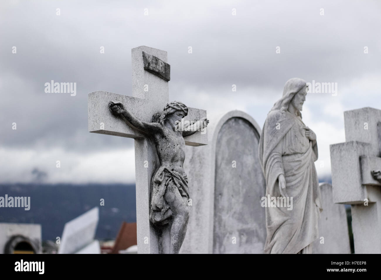 Photograph of a stone crucifix statue Stock Photo - Alamy