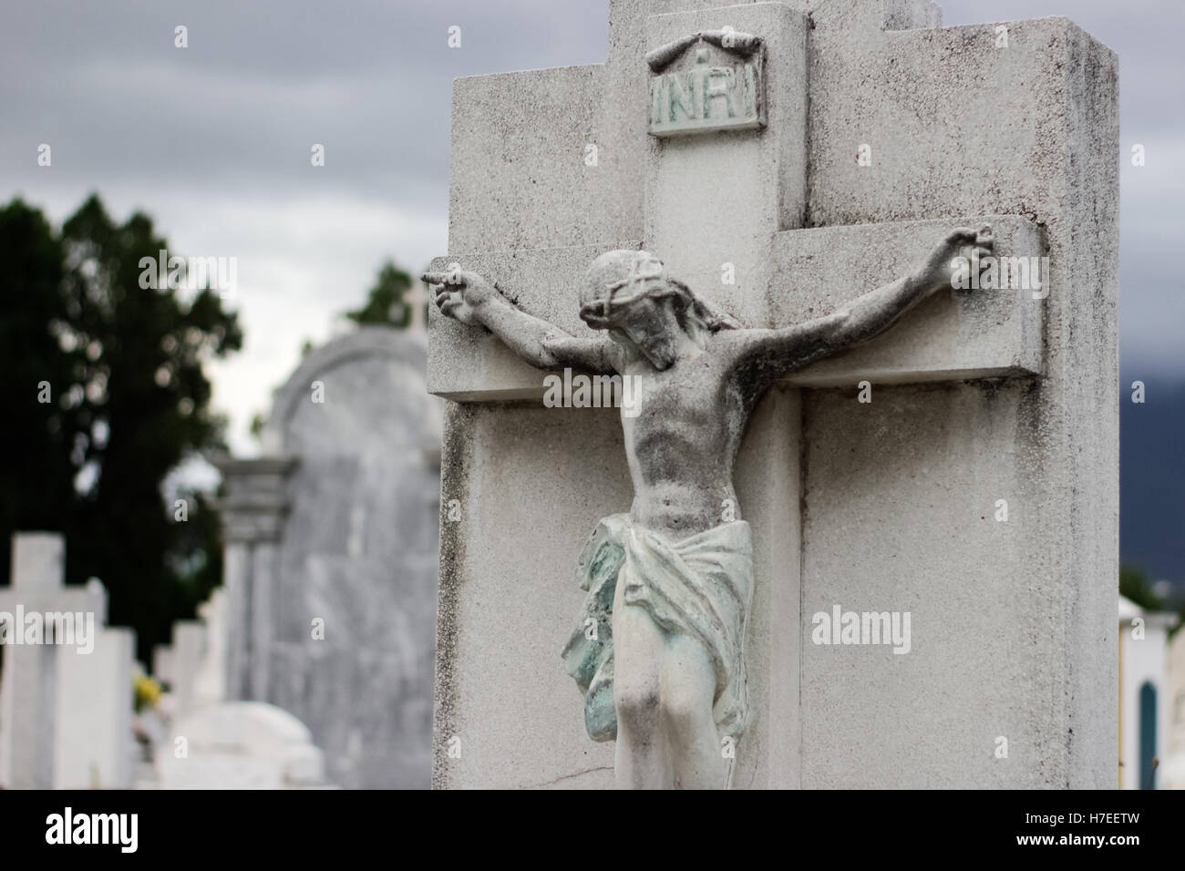 Photograph of a stone crucifix statue Stock Photo - Alamy