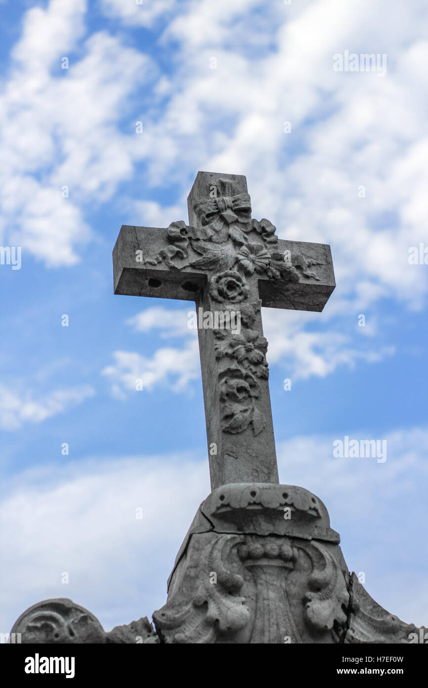 Photograph of a stone crucifix statue Stock Photo - Alamy
