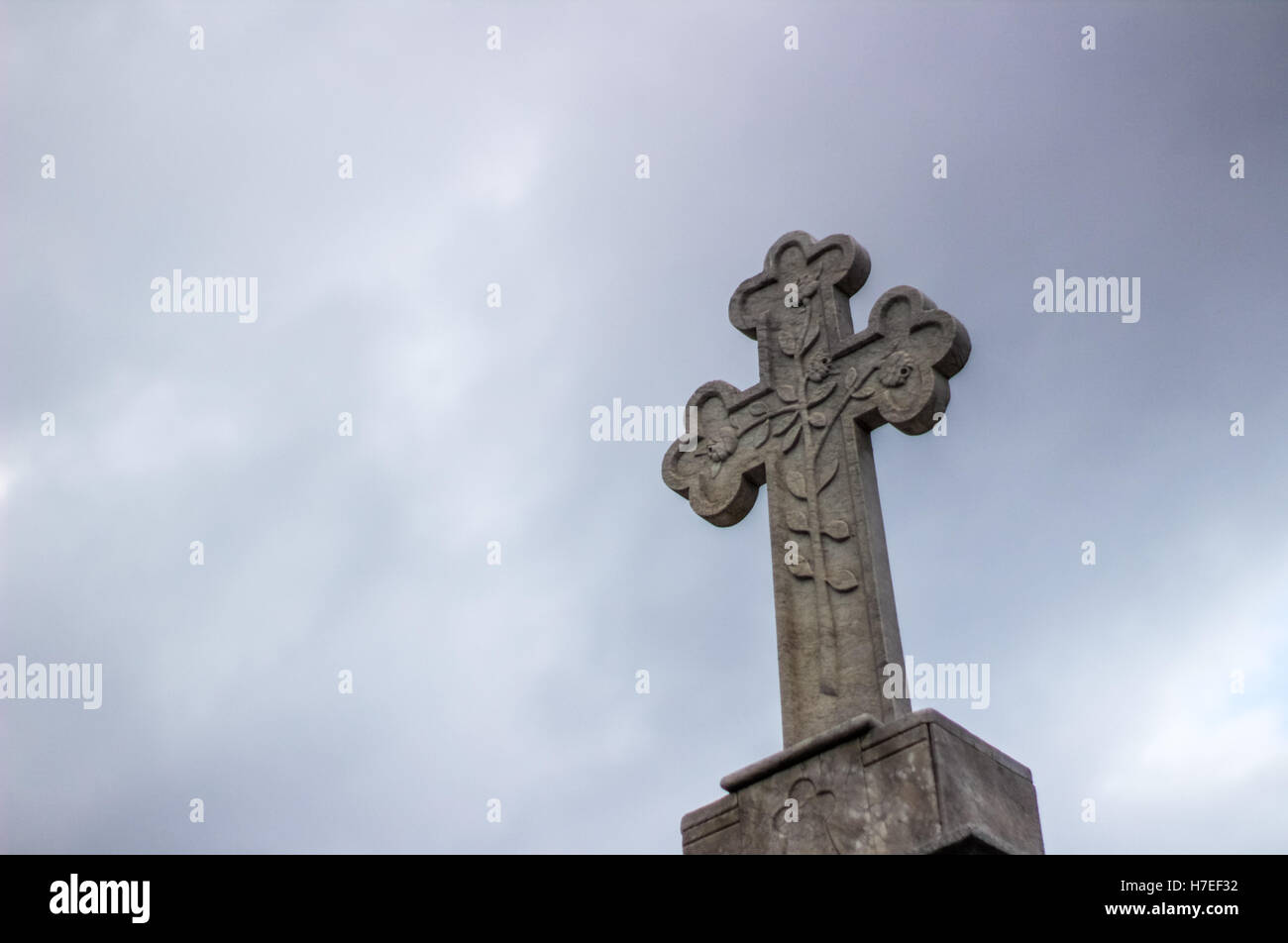 Photograph of a stone crucifix statue Stock Photo - Alamy