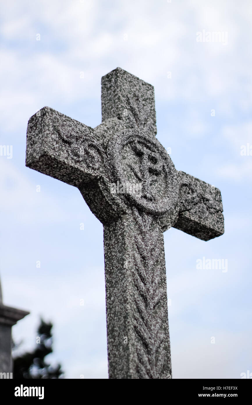 Photograph of a stone crucifix statue Stock Photo - Alamy