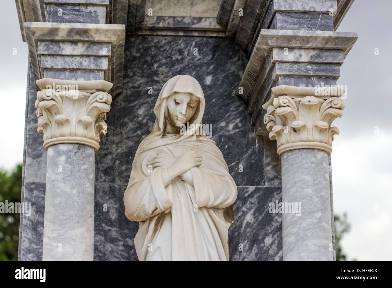 Photograph of a Virgin Mary stone statue Stock Photo - Alamy