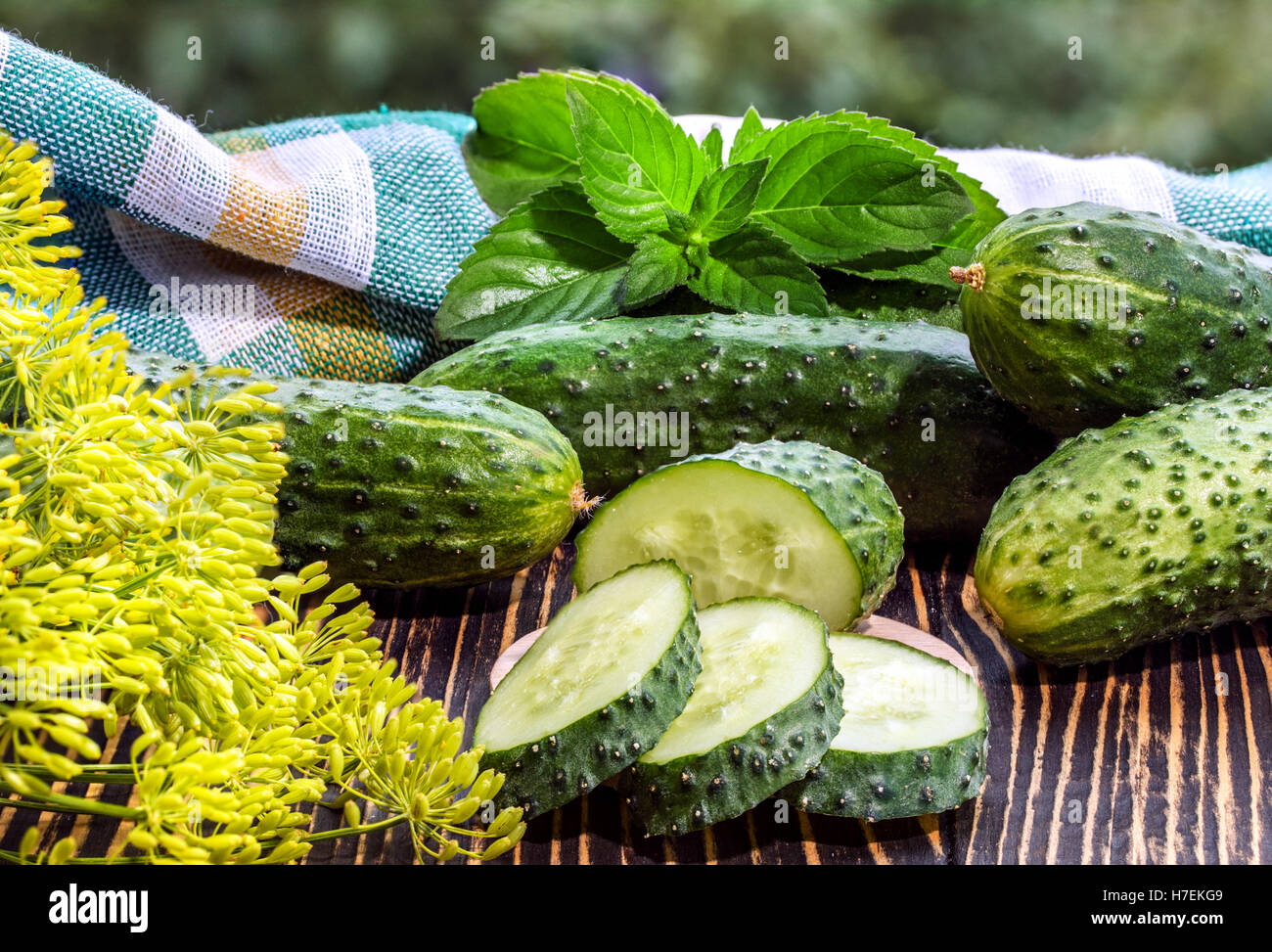 Fresh cucumber on the old wooden table Stock Photo - Alamy