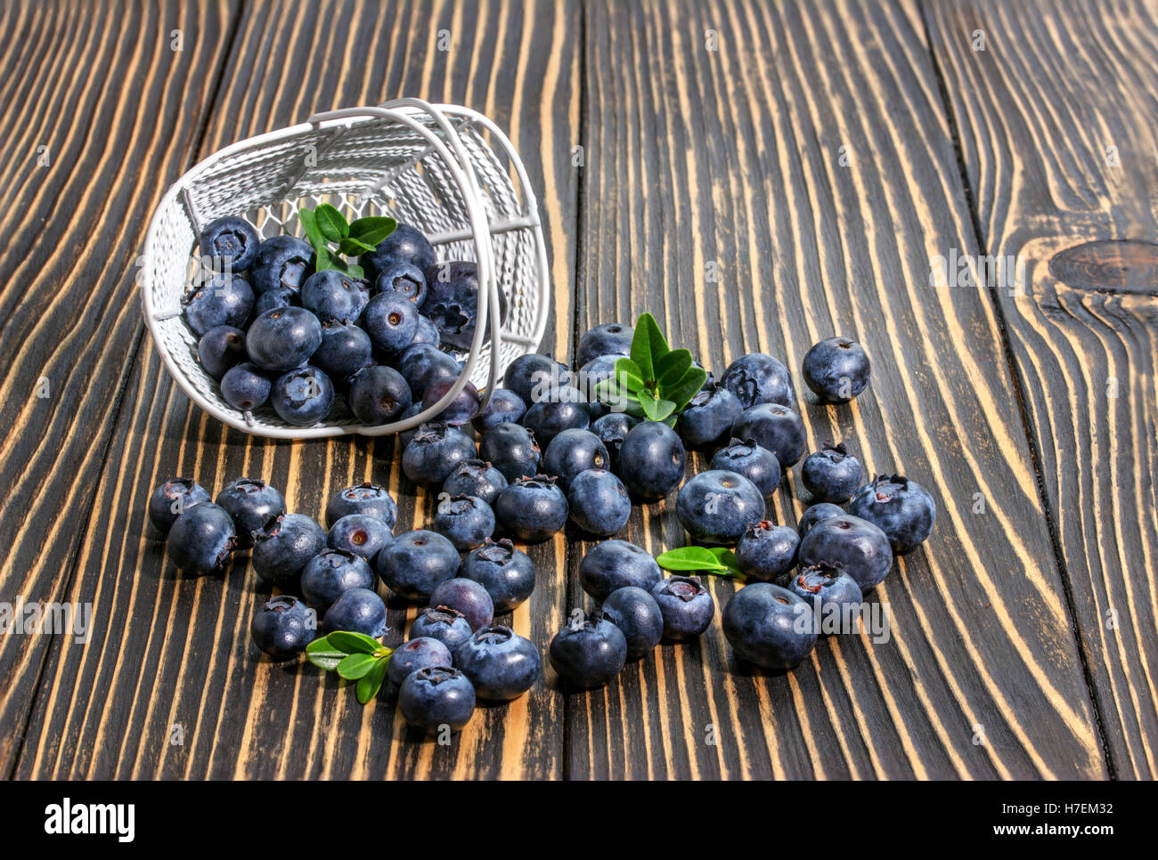 Blueberry on wooden table background. Ripe and juicy fresh picked ...