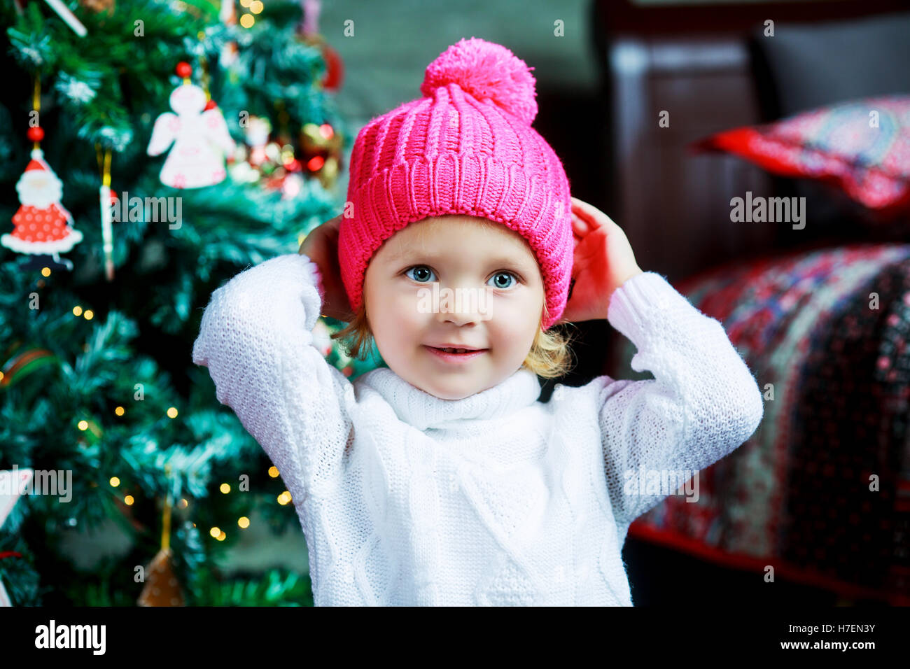 happy child at home with Christmas tree and presents Stock Photo - Alamy