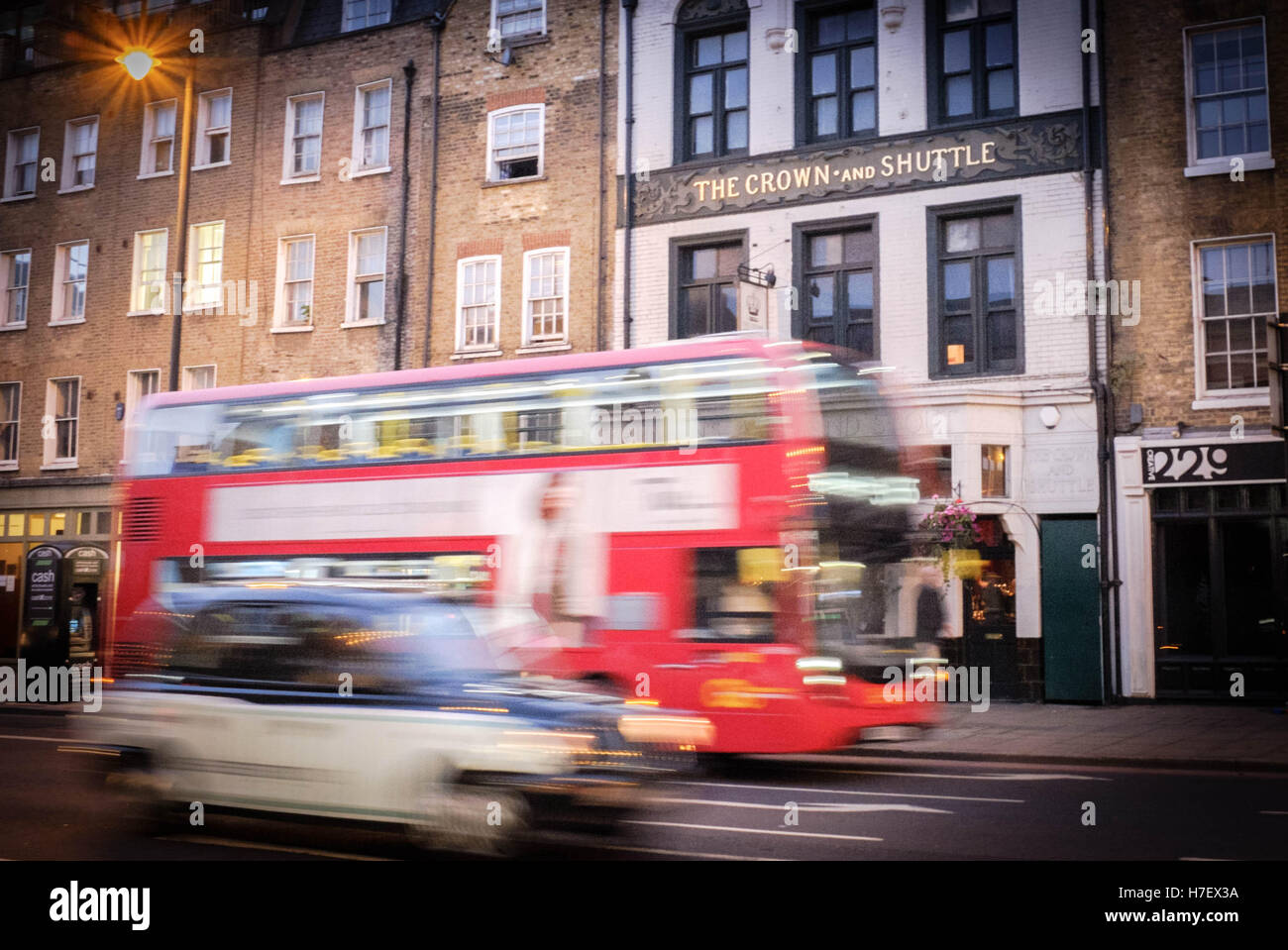 London bus and taxi outside the Crown And Shuttle, Shoreditch Stock ...