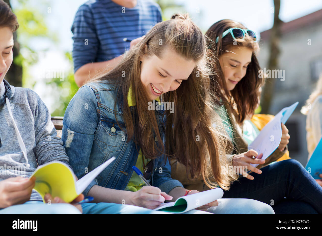 group of students with notebooks at school yard Stock Photo - Alamy