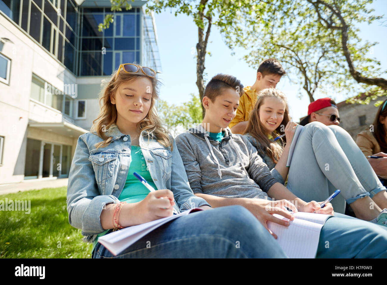 group of students with notebooks at school yard Stock Photo - Alamy