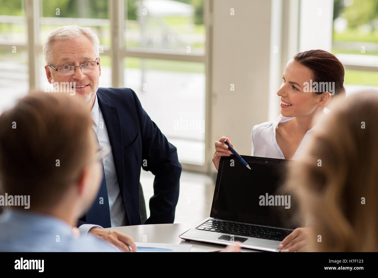 business people with laptop meeting in office Stock Photo - Alamy