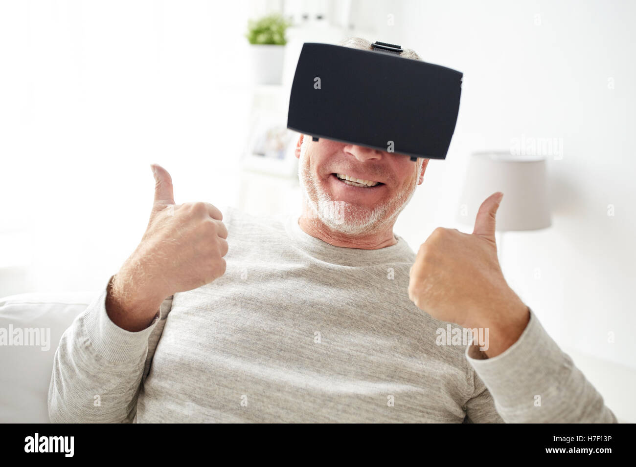 old man in virtual reality headset or glasses Stock Photo - Alamy