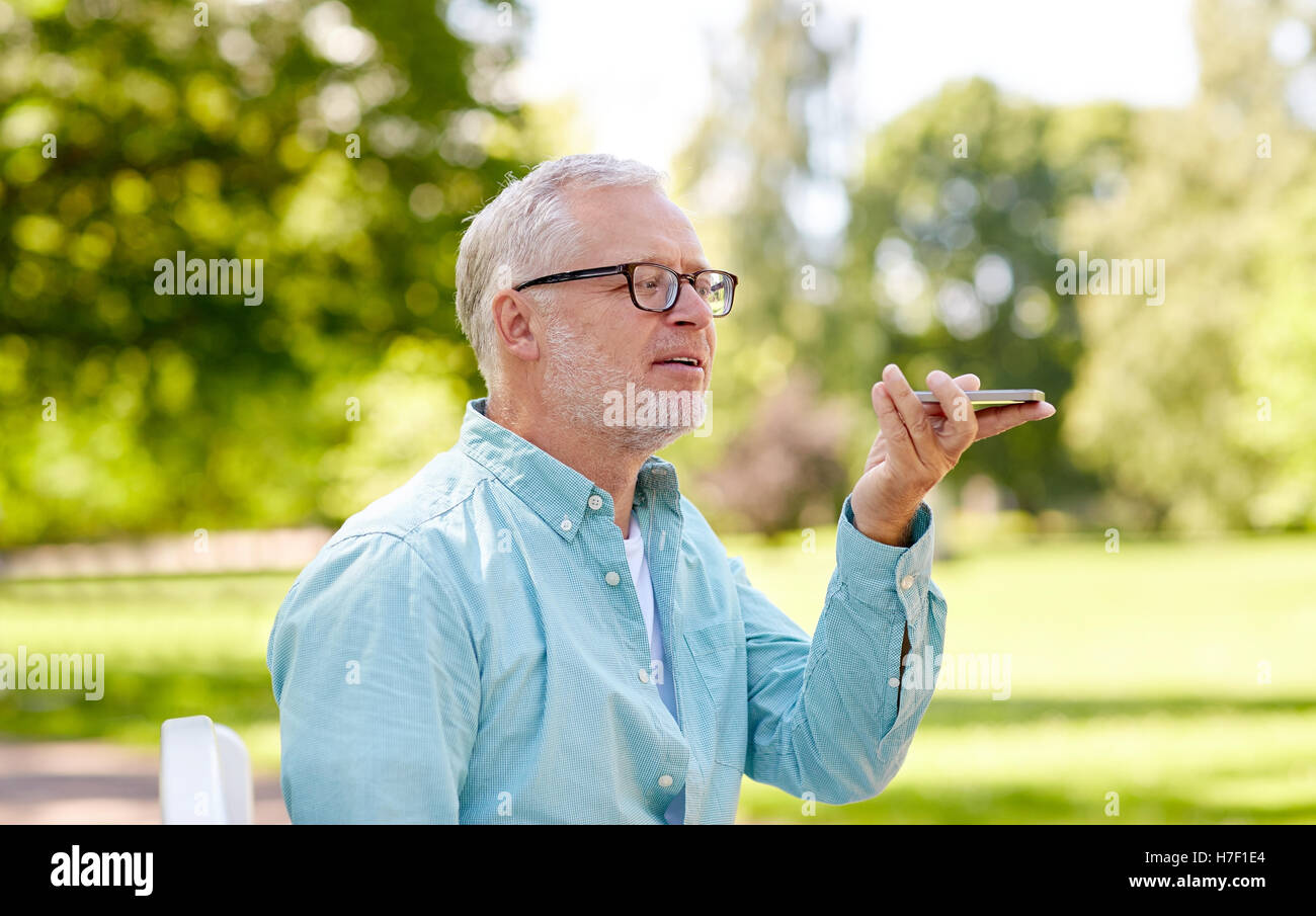 old man using voice command recorder on smartphone Stock Photo - Alamy