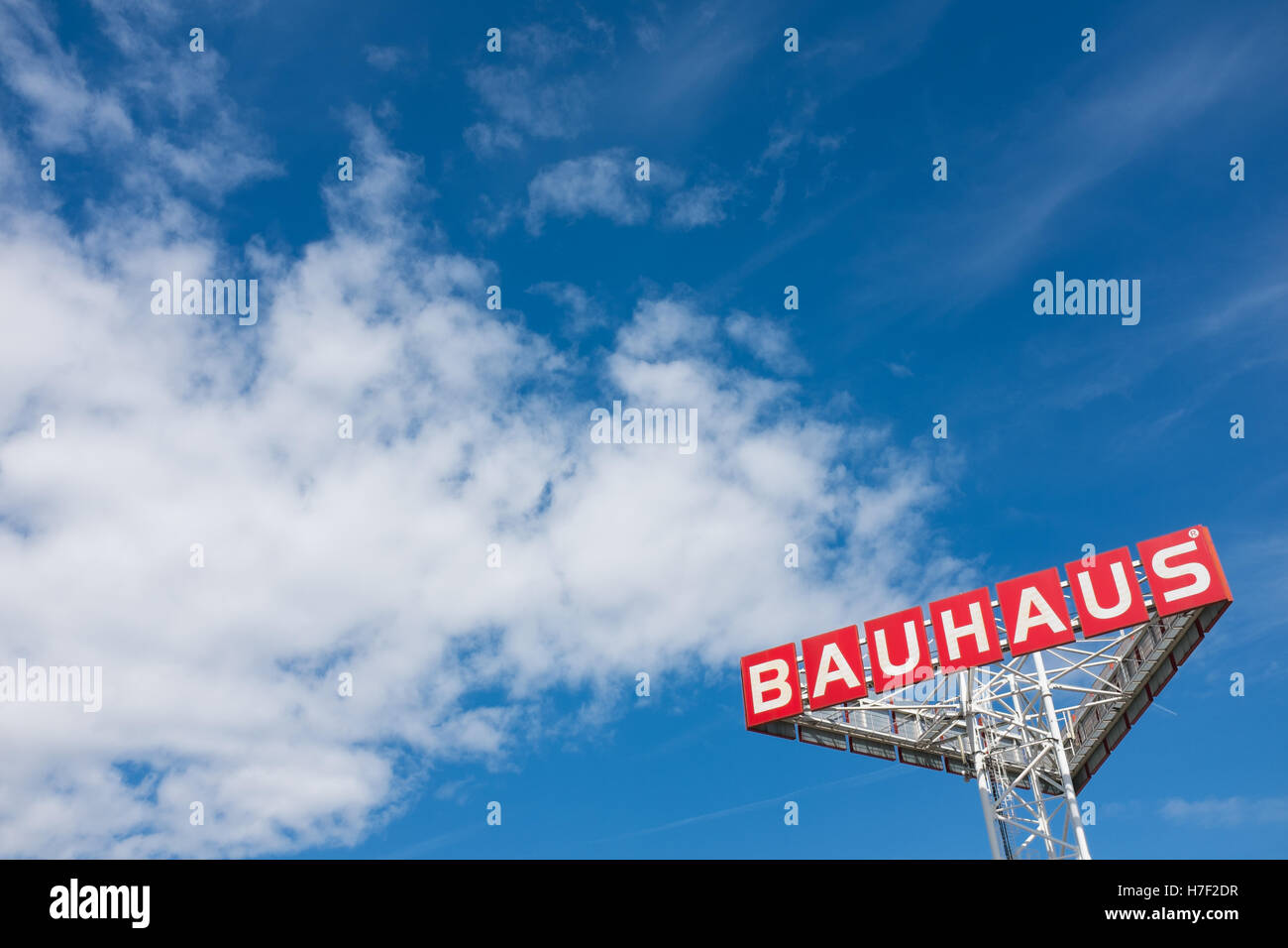 Bauhaus company sign against blue sky with white clouds Stock Photo - Alamy