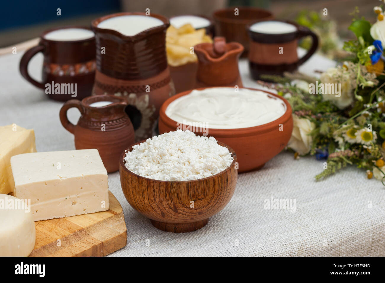 Dairy products on wooden table Stock Photo - Alamy