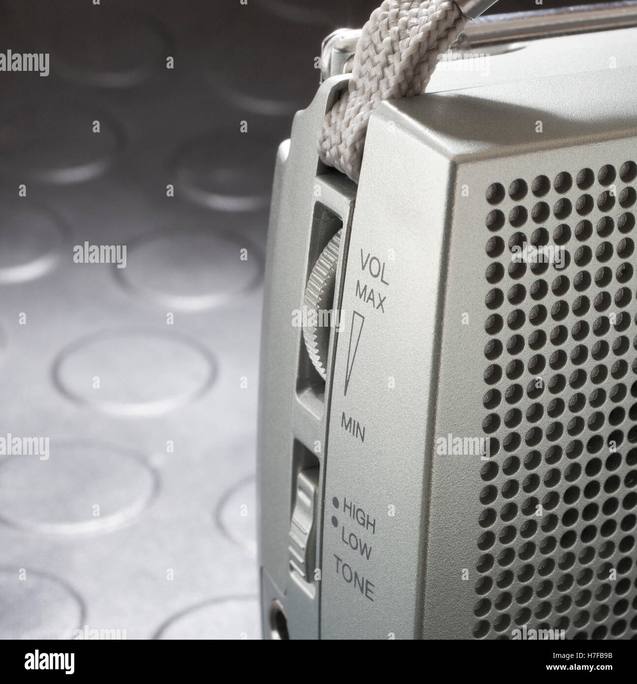 Dial to adjust the volume on a portable shortwave radio Stock Photo - Alamy