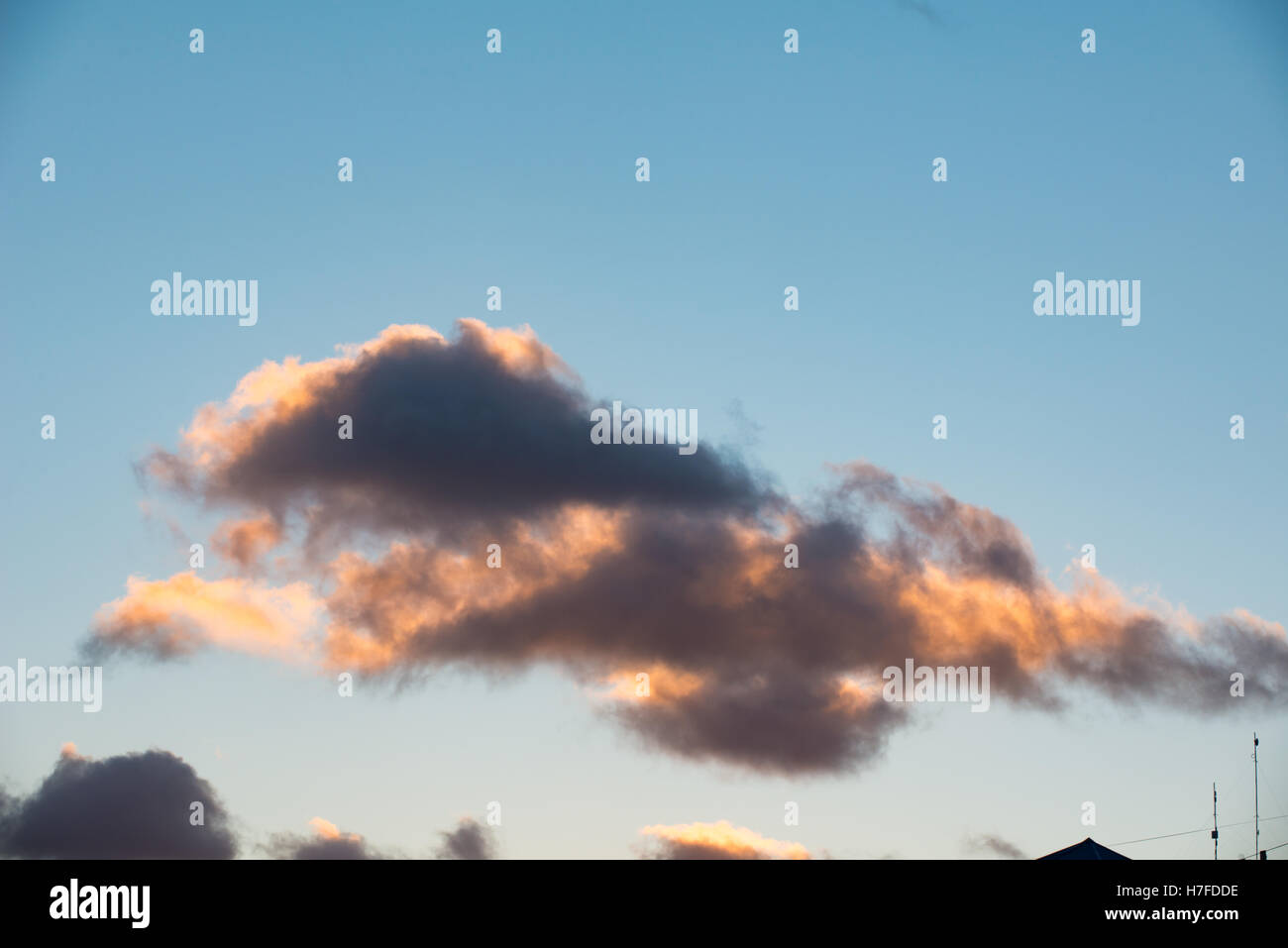 Puffy and colorful sunset clouds Stock Photo - Alamy