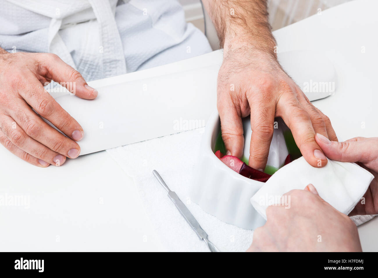 Hand preparation to manicure at the beauty salon Stock Photo - Alamy