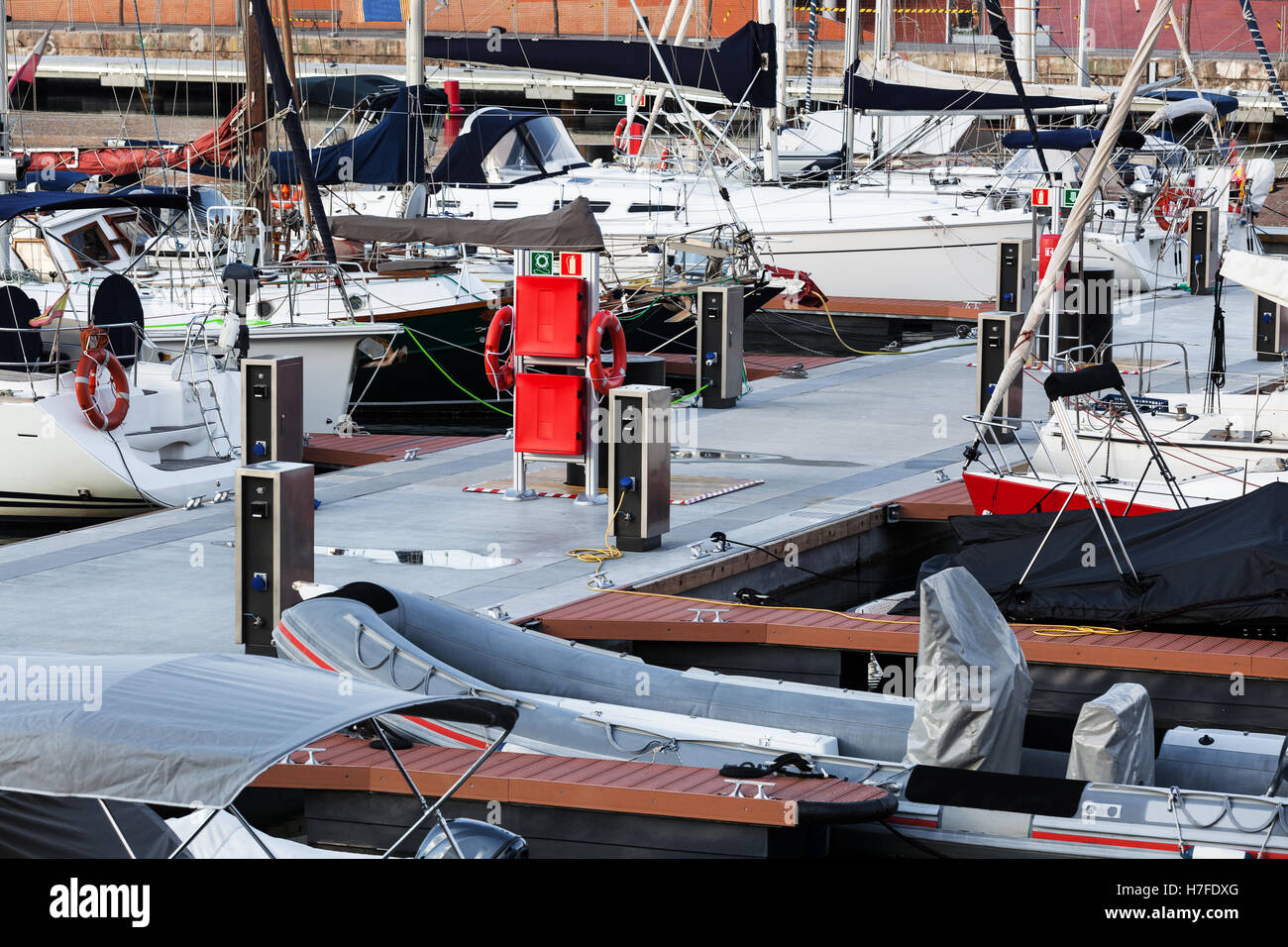 modern yachts docked in the port Stock Photo - Alamy