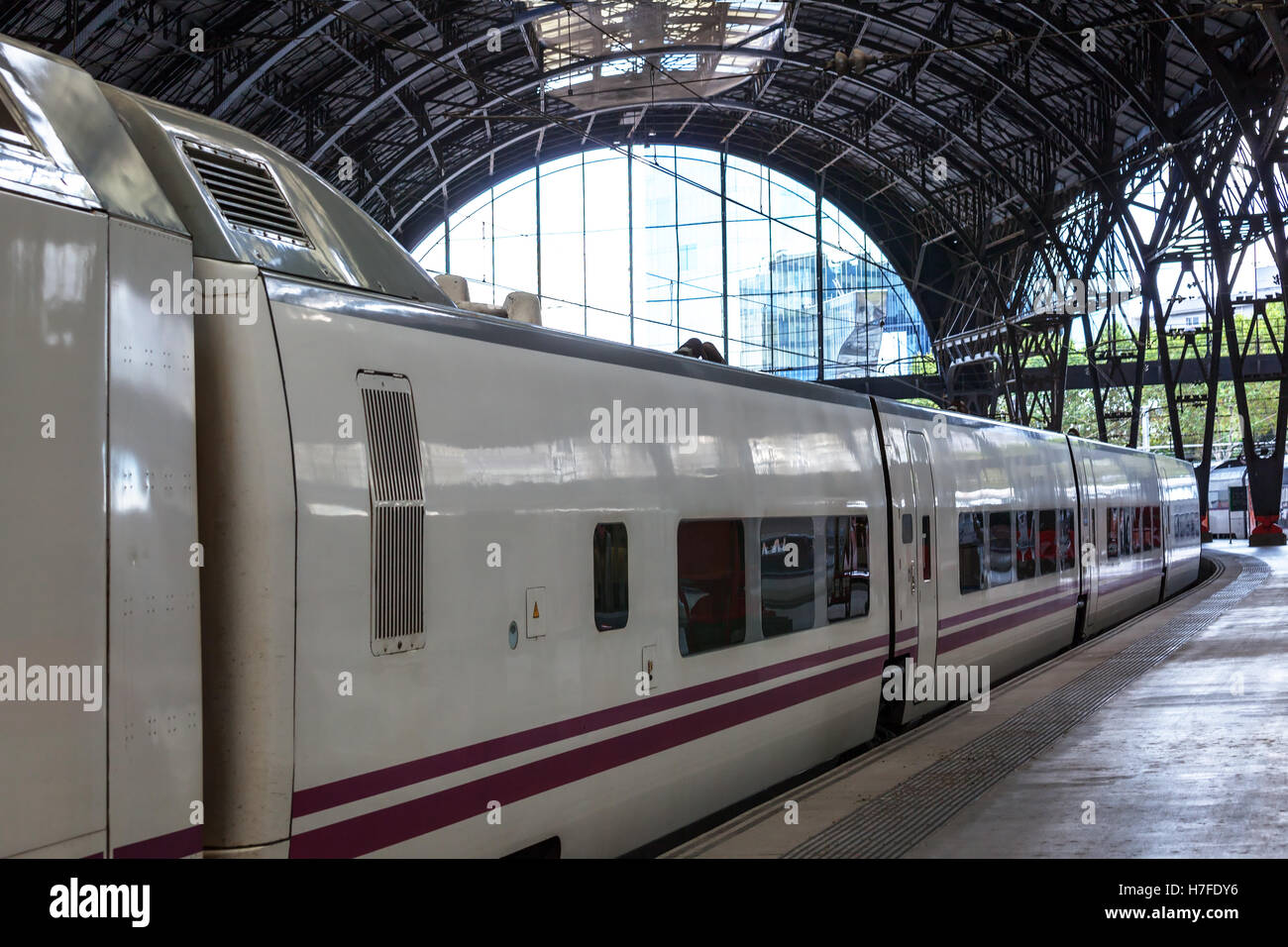 train cars on a modern train station Stock Photo - Alamy