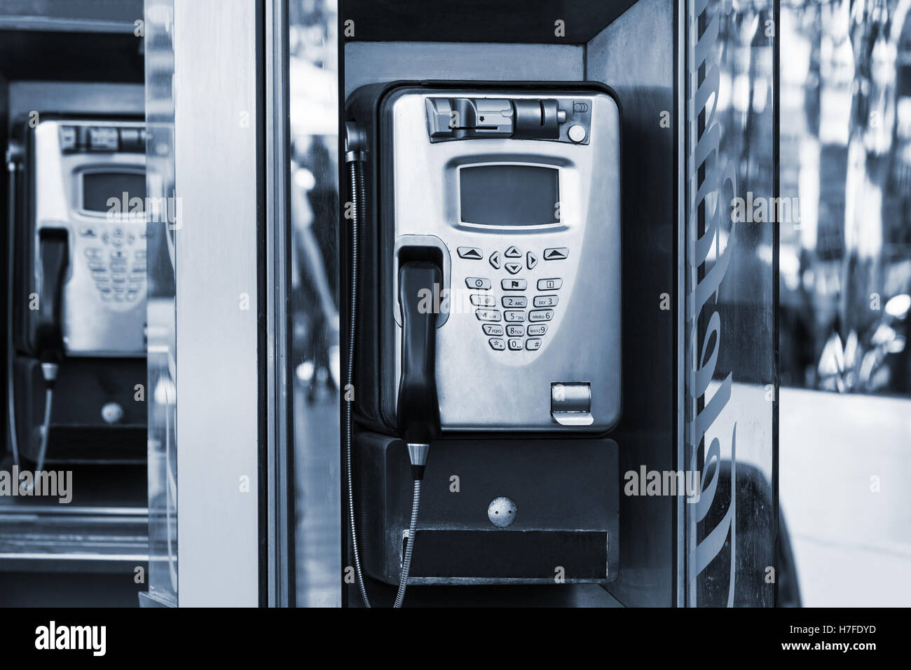 modern payphone on a city street Stock Photo - Alamy